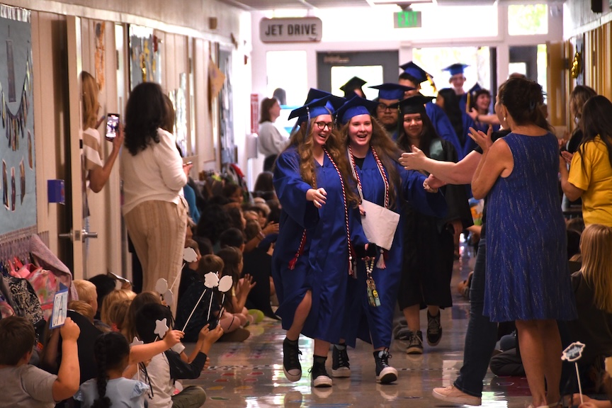 ‘A whole lot of nostalgia:’ Class of 2025 revisits former schools with ...