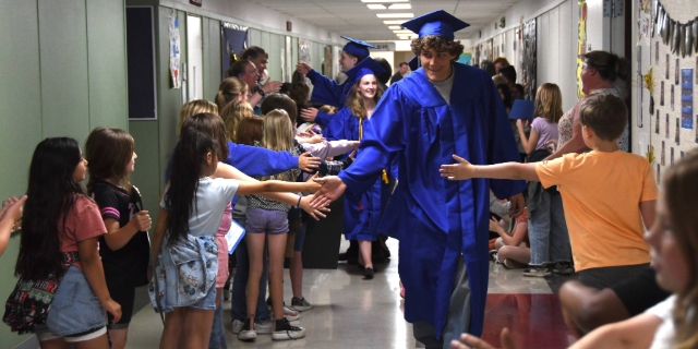 ‘A whole lot of nostalgia:’ Class of 2025 revisits former schools with ...